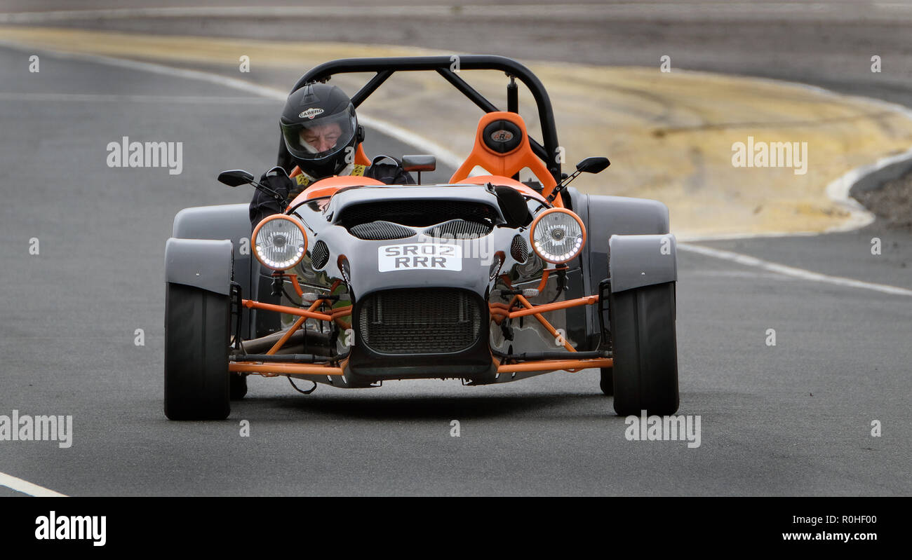 Caterham sports car at speed on track day event Stock Photo - Alamy