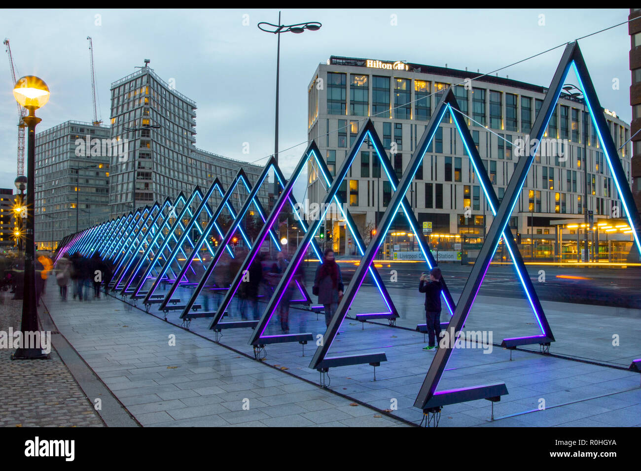 Blue infinity illuminated triangles hi-res stock photography and images ...