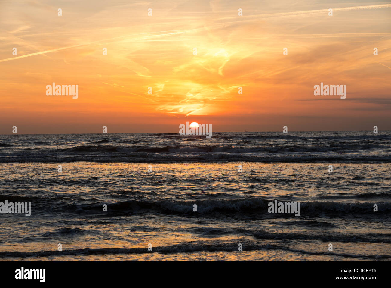 Scenic View Of Sea Against Orange Sky Stock Photo - Alamy