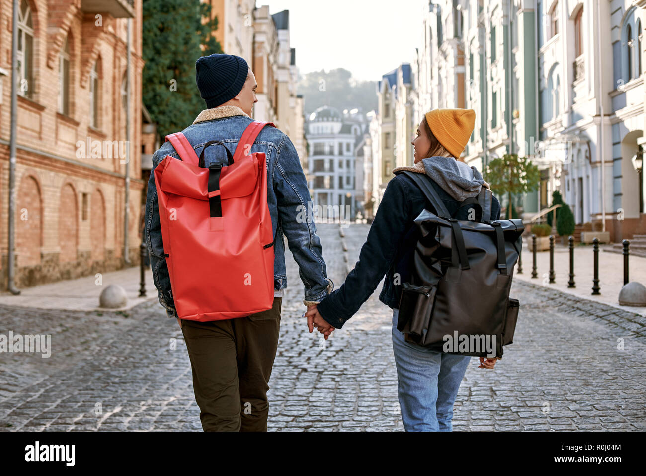 Traveler couple bloggers in love are enjoying view of old city Stock ...