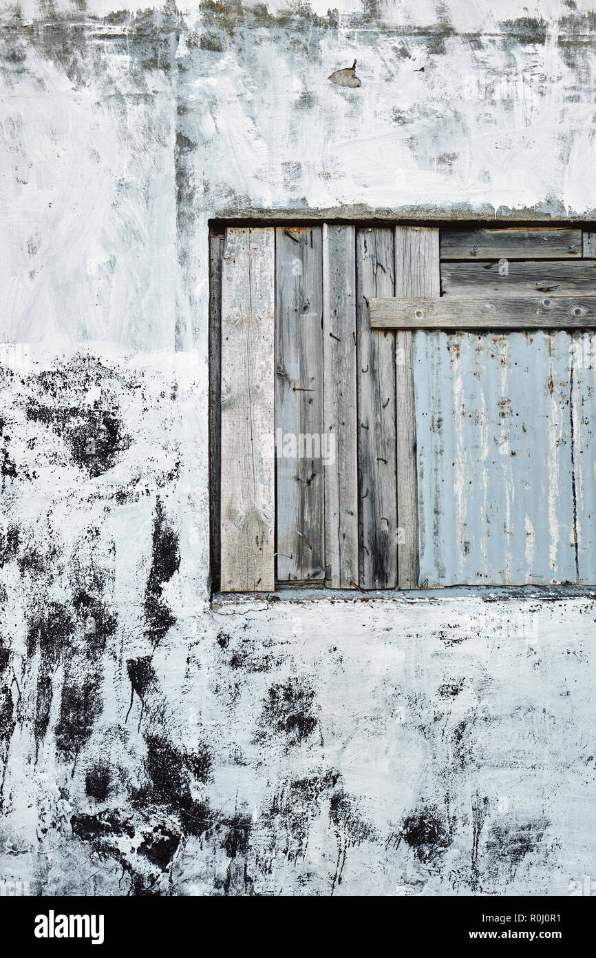 A boarded up window detail Stock Photo - Alamy