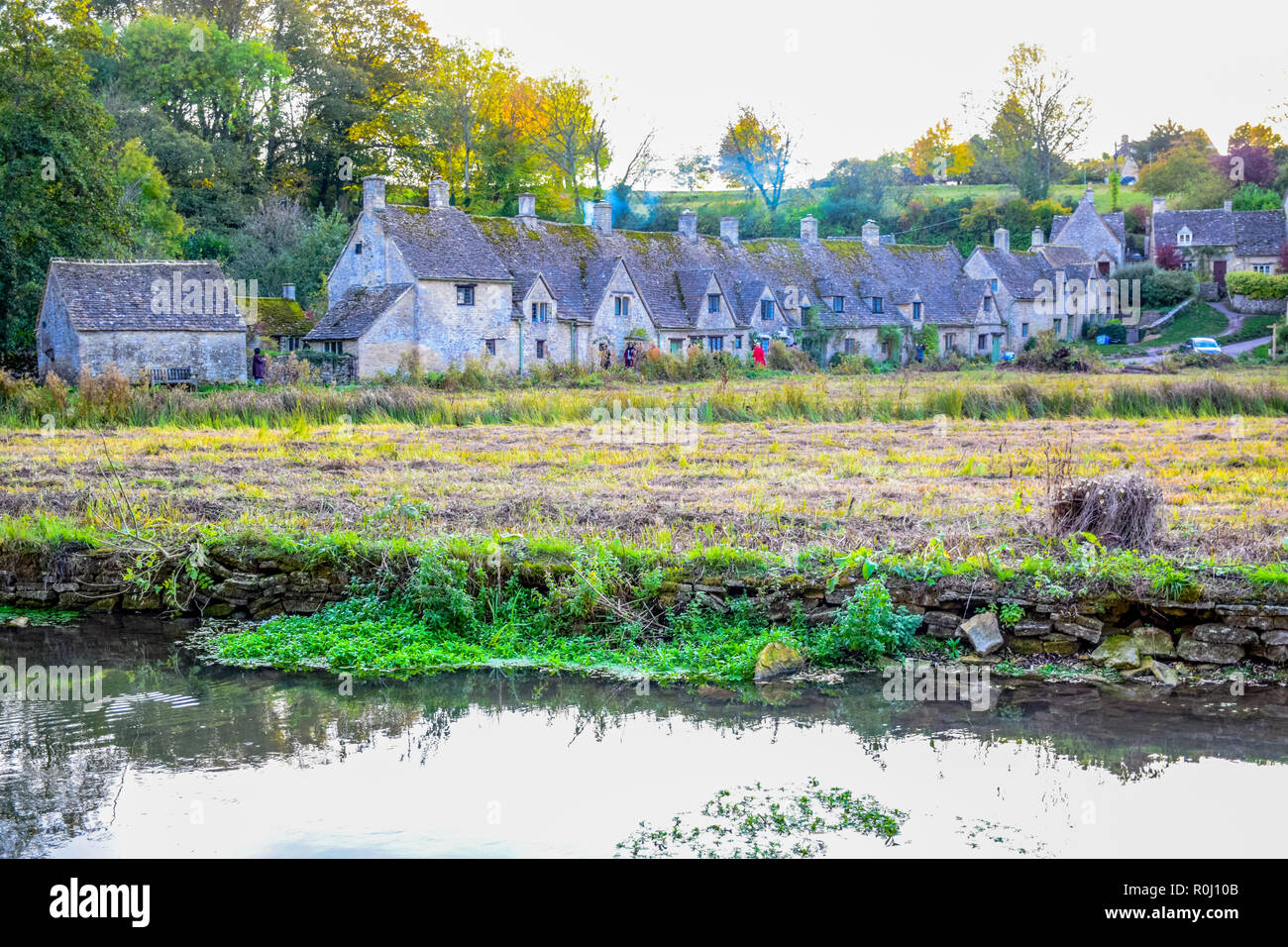 Beautiful old village of Bibury in Cotswold district in Gloucestershire ...