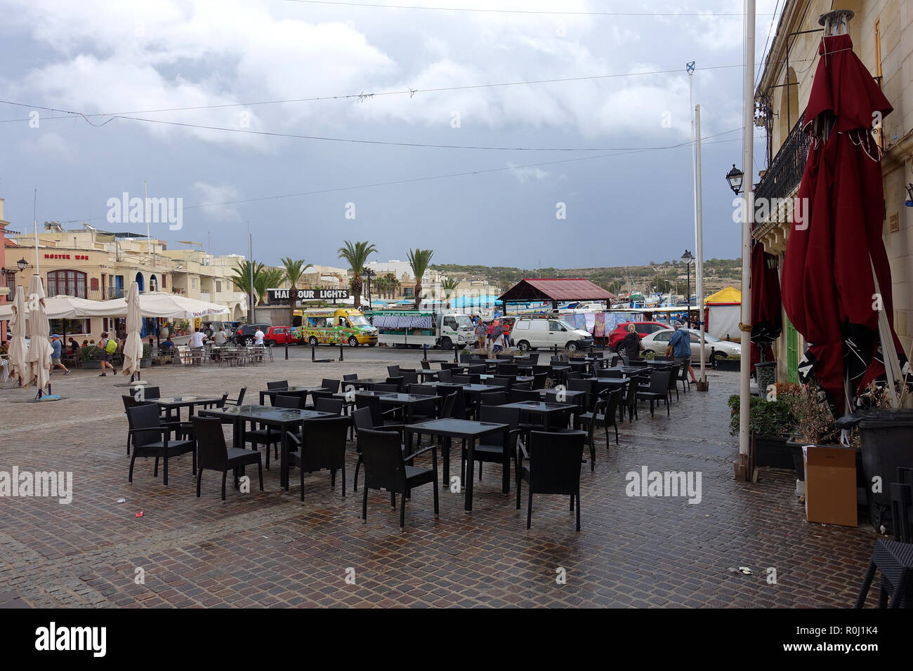 Cafes and restaurants close down as storm clouds gather over the Main ...