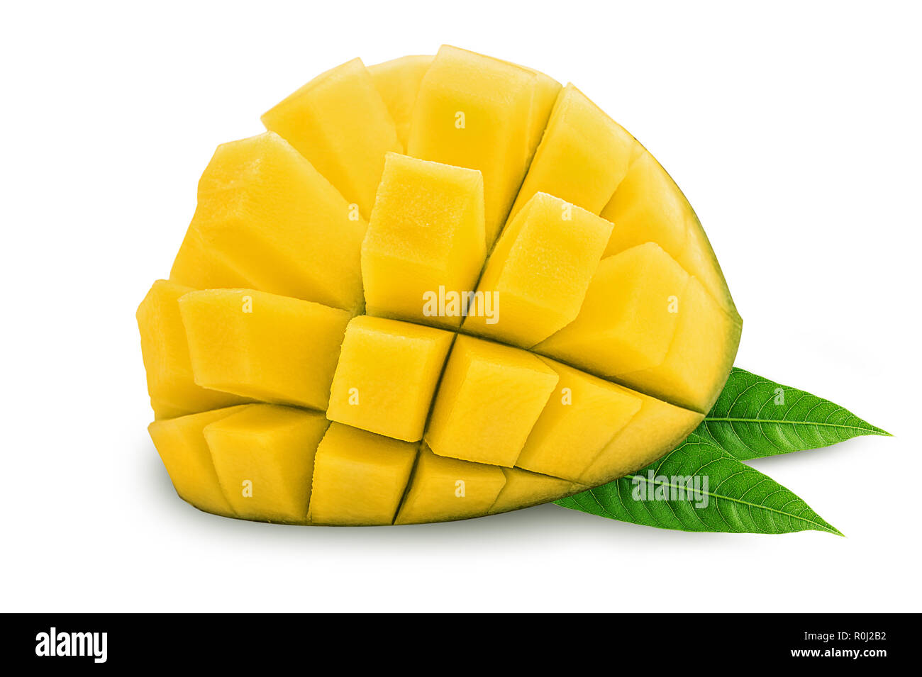Mango exotic friut cut in half cubes with leaf isolated on white ...
