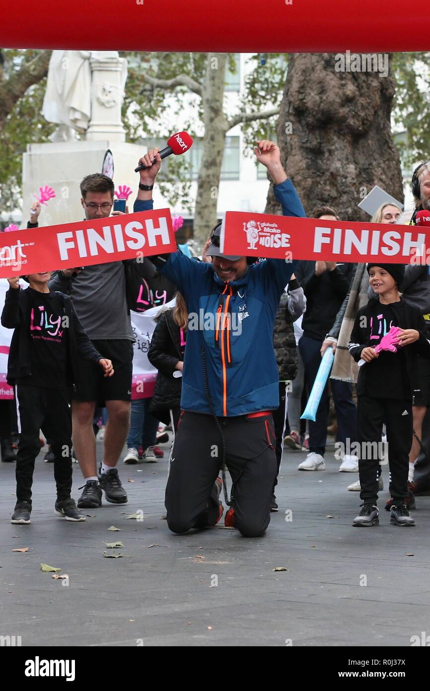 Jamie Theakston completing his charity marathon event at Global studios ...