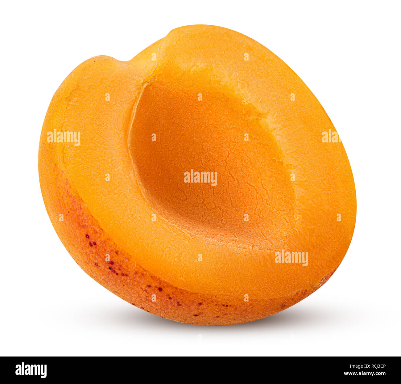 Fresh ripe apricot cut in half isolated on white background. Clipping ...