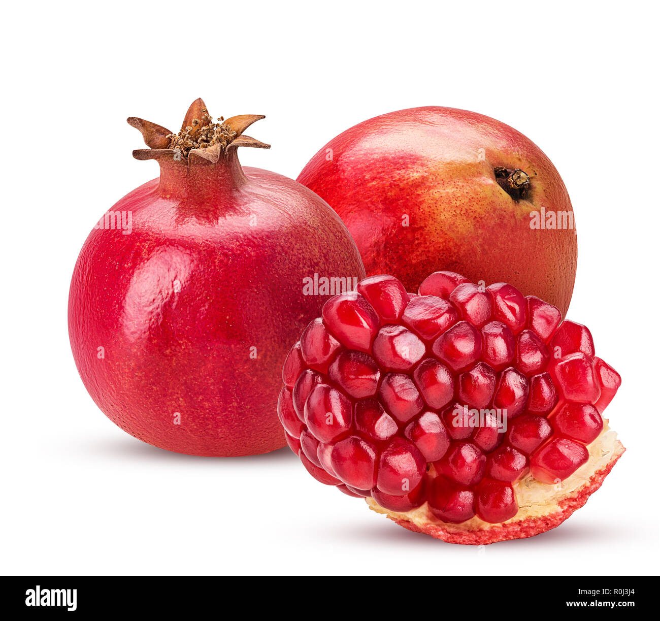 Two pomegranate and piece isolated on white background. Clipping Path ...