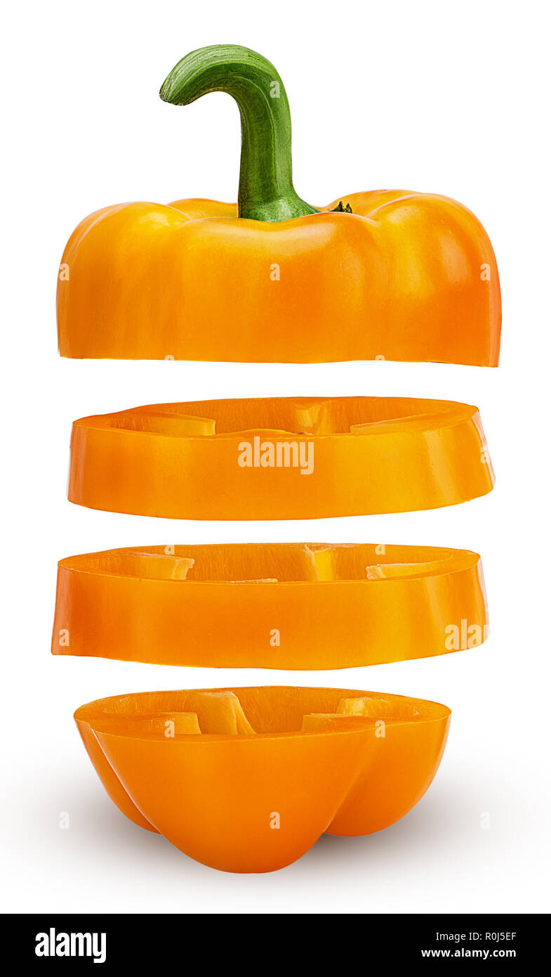 Slices yellow bell pepper flying in the air isolated on white ...