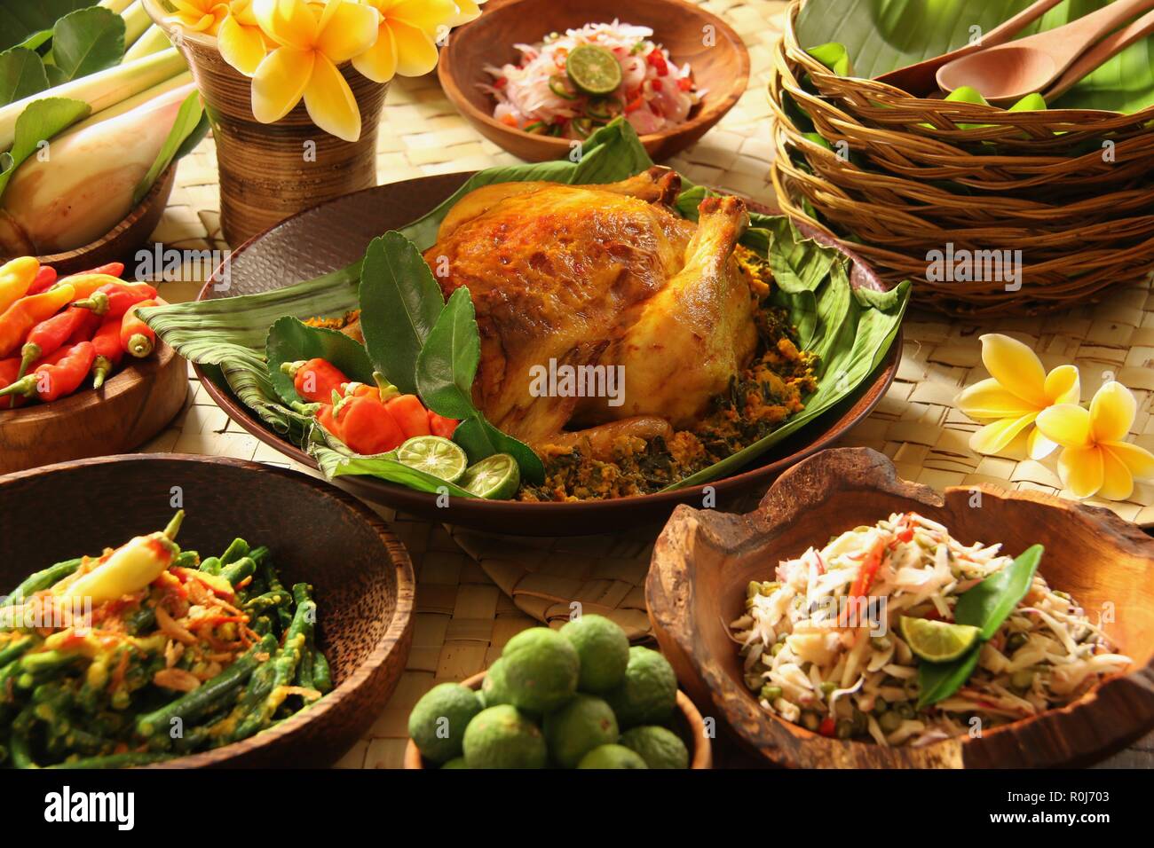 Ayam Betutu. Balinese spicy roast chicken with cassava leaves sutffing ...