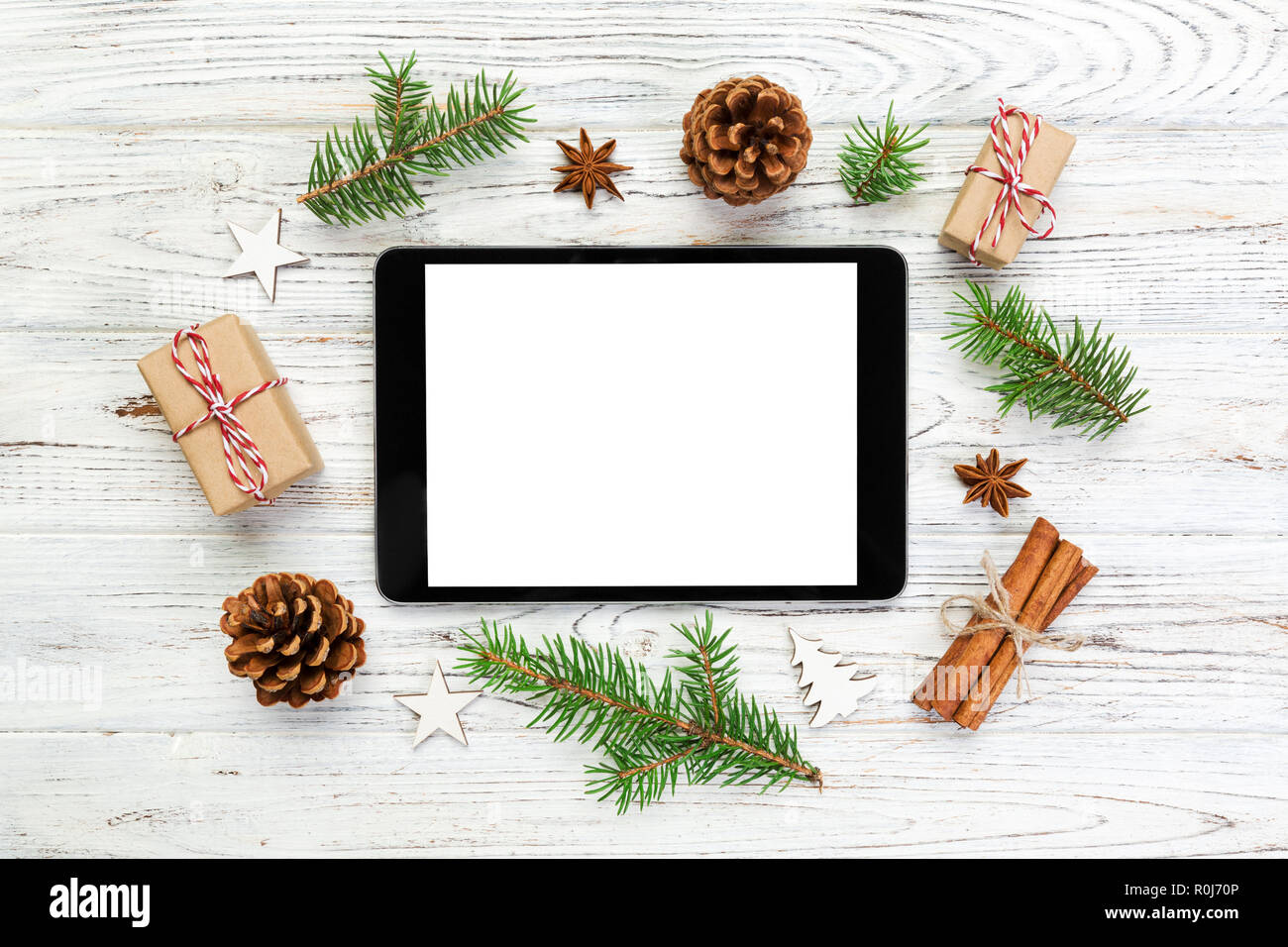 Digital tablet mock up with rustic Christmas wooden background ...