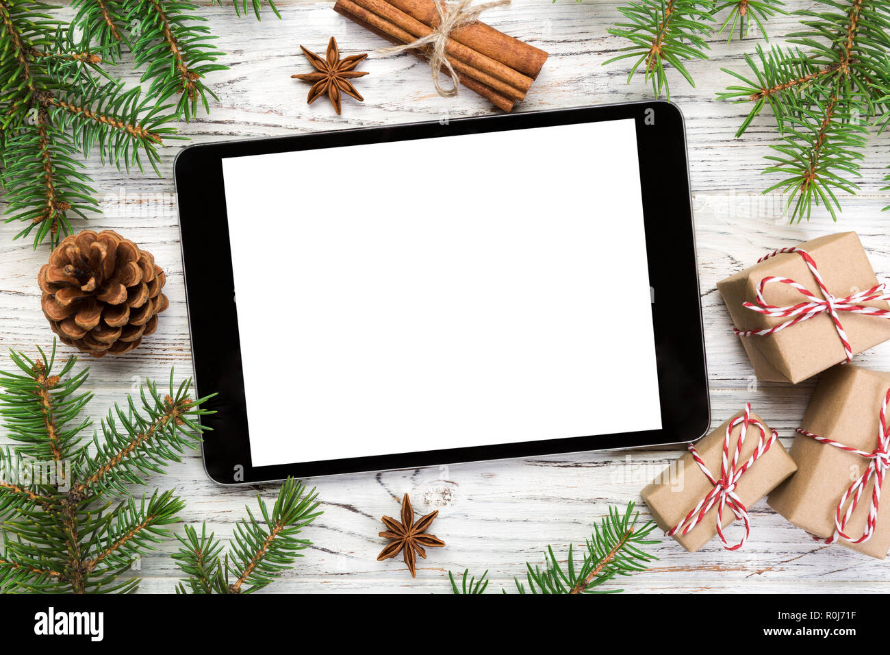 Digital tablet mock up with rustic Christmas wooden background ...