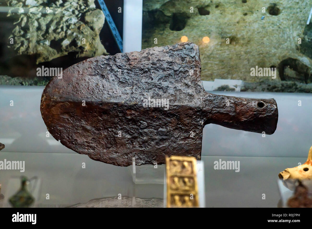 Ancient metal shovel end on display in museum Stock Photo - Alamy