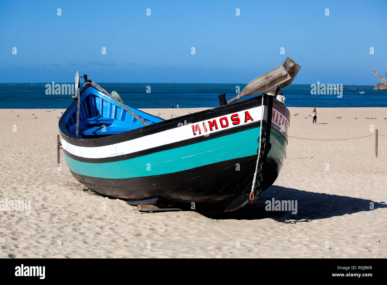 Nazare, Portugal - colorful traditional old wooden fishing boat on the ...