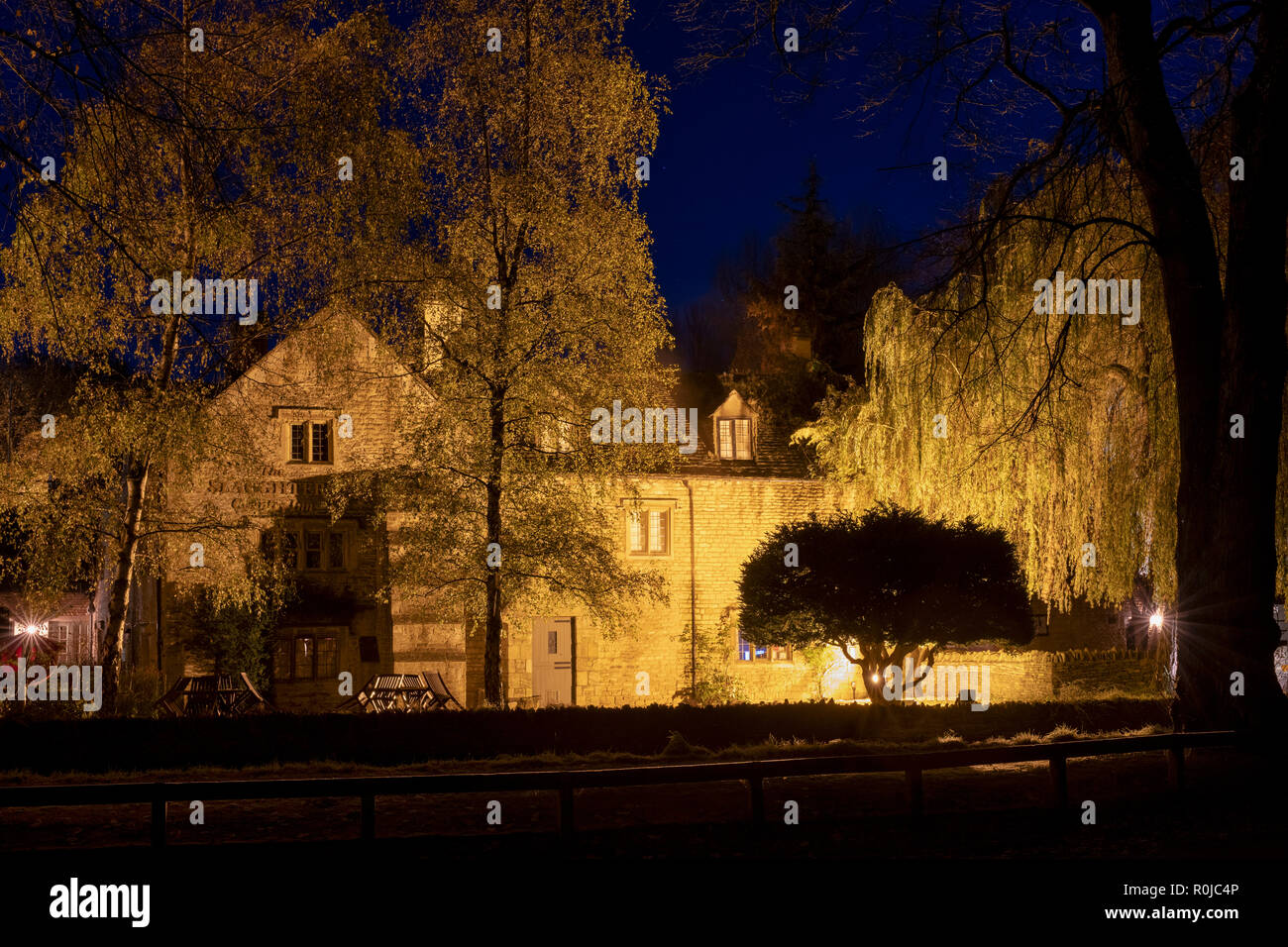 The Slaughters country inn in the early autumn morning before dawn ...