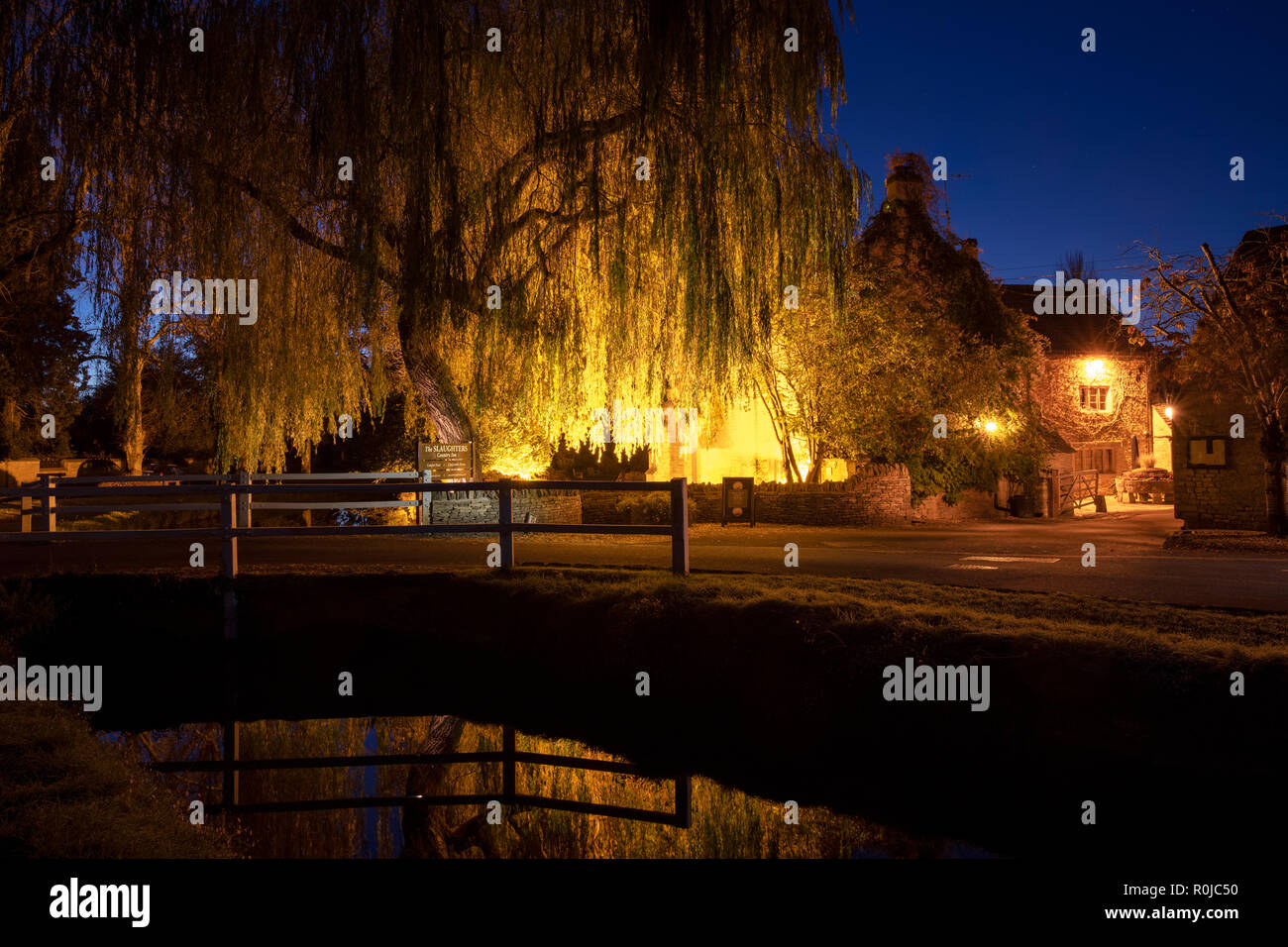 The Slaughters country inn in the early autumn morning before dawn ...