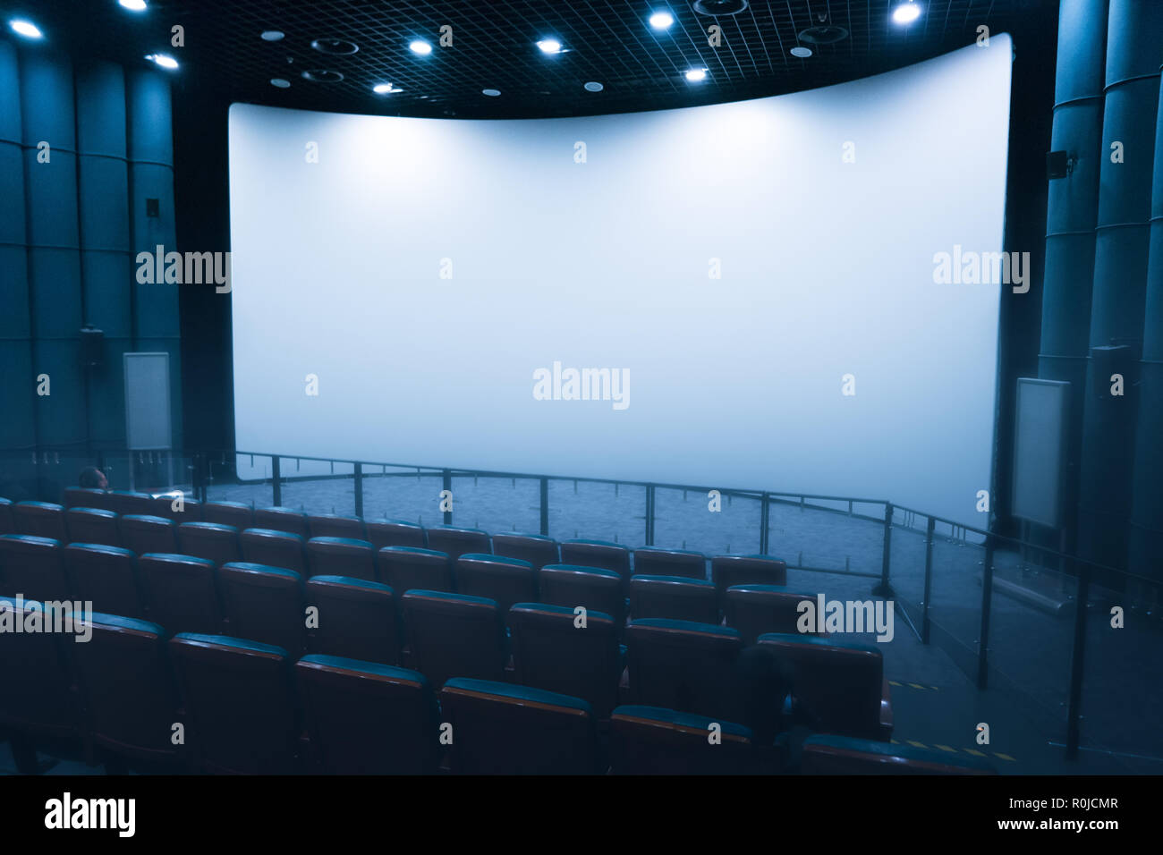 Empty stage in the small movie theater with white screen Stock Photo ...