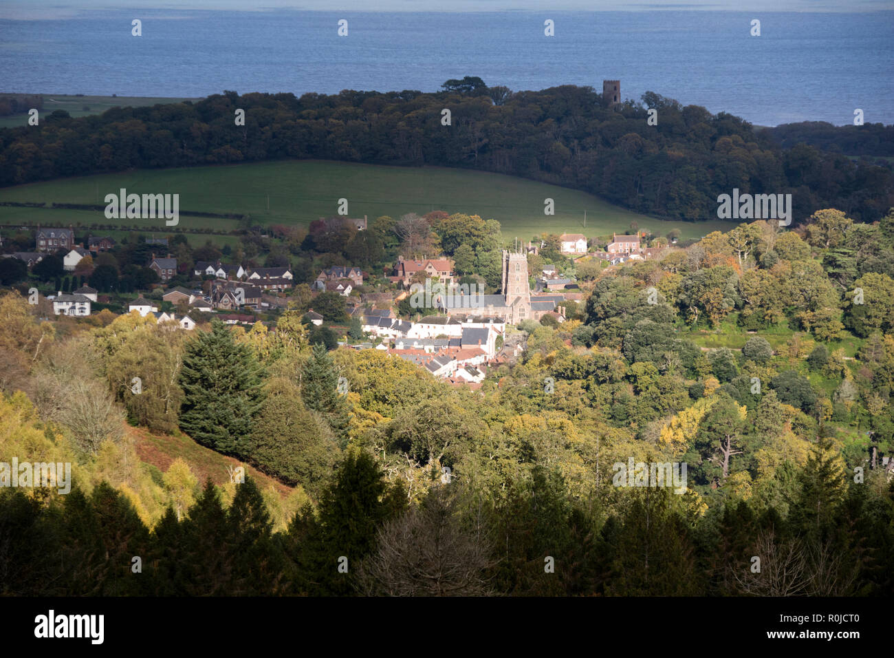 Autumn light over Dunster village, Exmoor National Park, Somerset ...