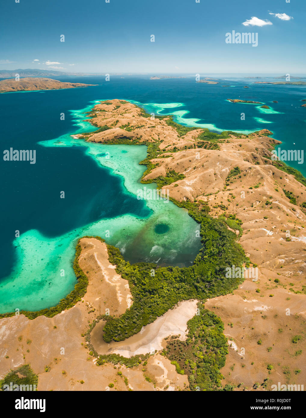 Bays, savanna lands, ocean. Komodo. Aerial view. Spectacular panorama ...