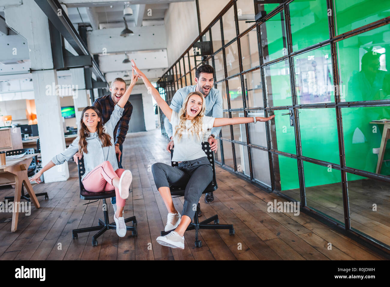 happy young business people having fun together at workspace Stock ...