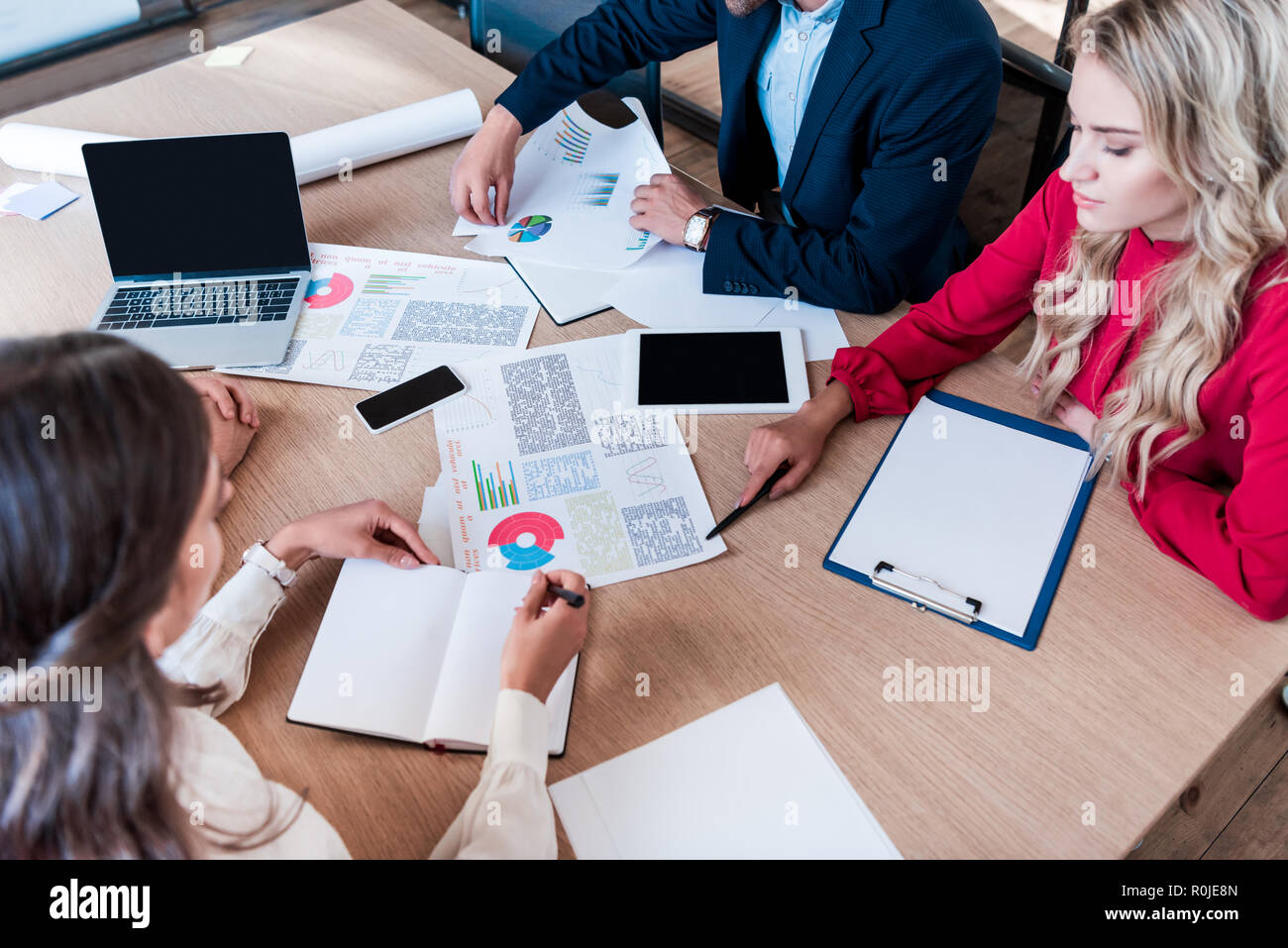 partial view of business team working on new business idea together at ...