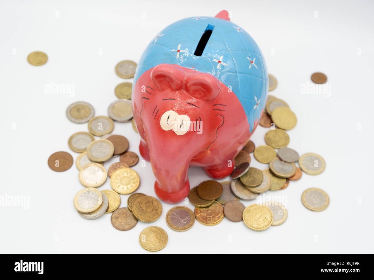 Colorful cute ceramic elephant piggy bank cut out isolated on white ...