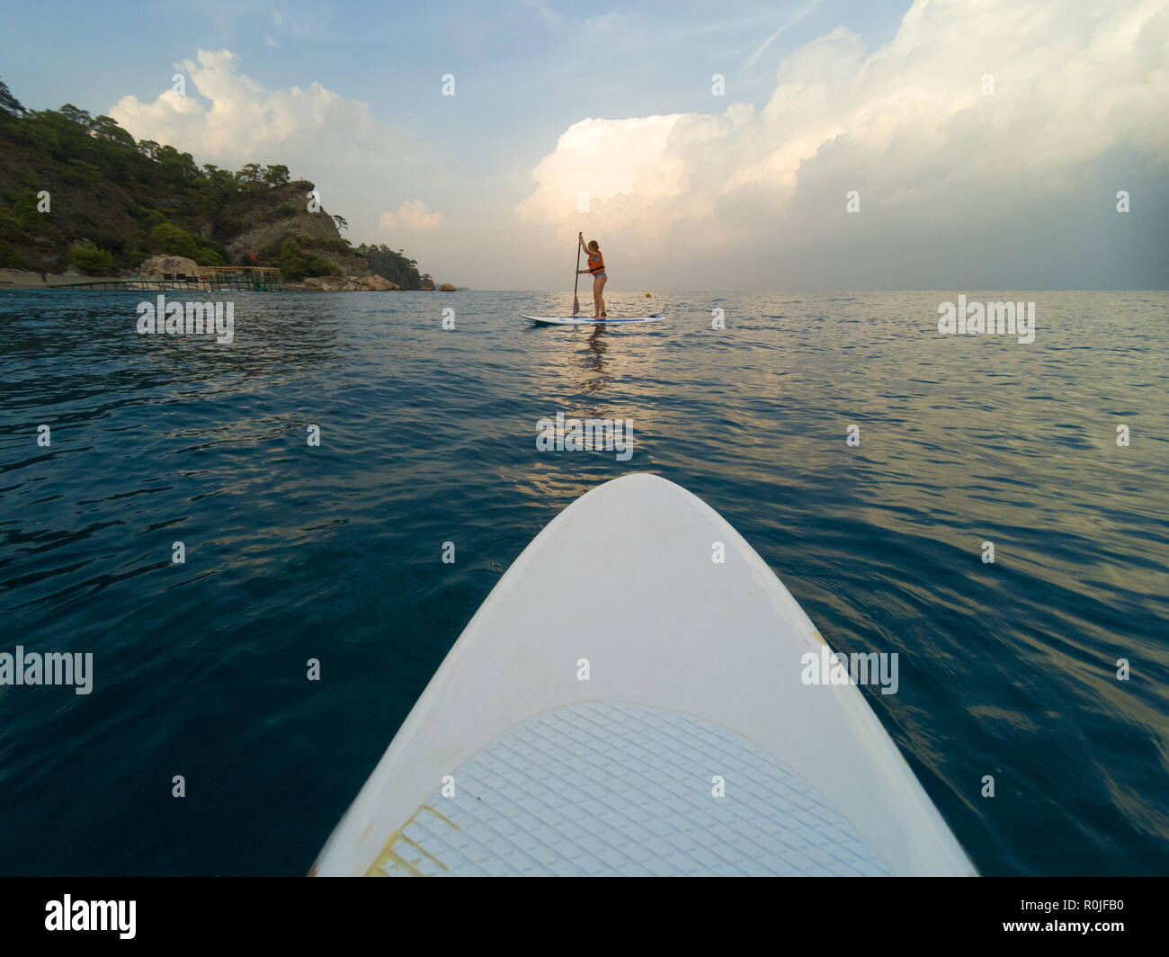 Stand up paddle boarding Stock Photo - Alamy
