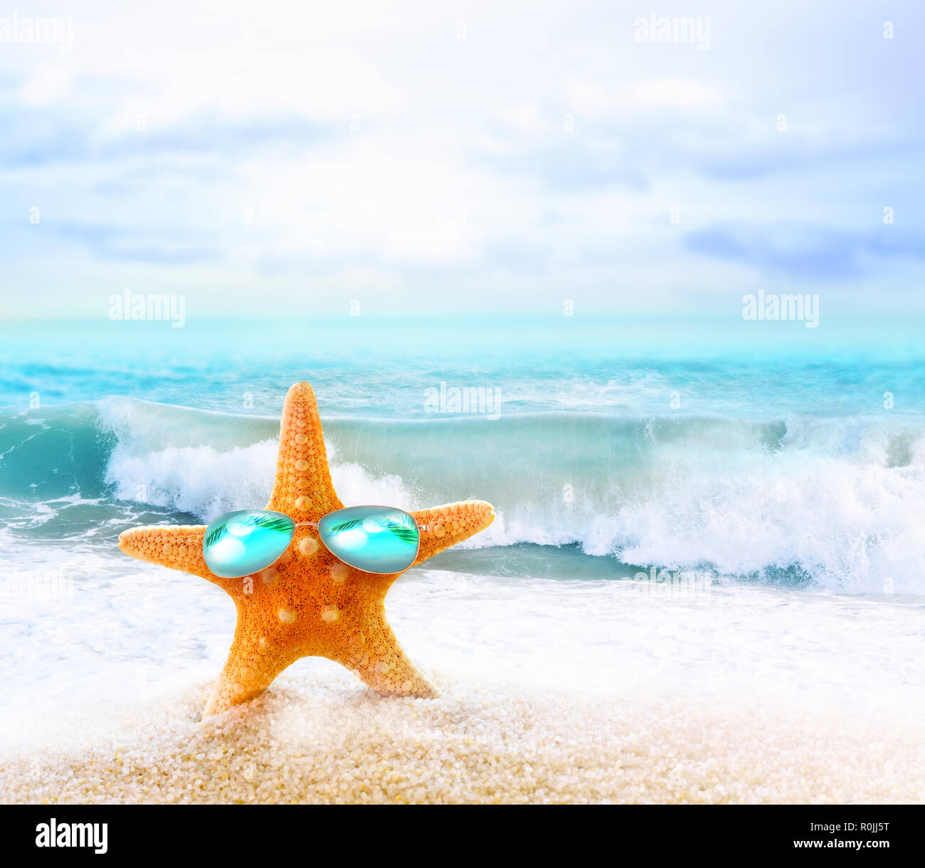 Beach. Summer. Starfish in sunglasses on the seashore Stock Photo - Alamy