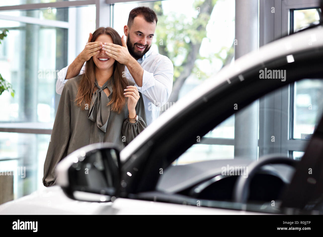 Woman buying present for man hi-res stock photography and images - Alamy