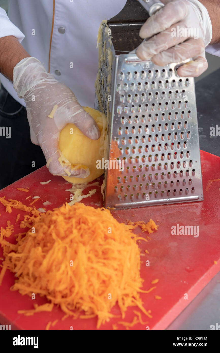 Chef in hotel or restaurant kitchen cooking only hands Stock Photo - Alamy