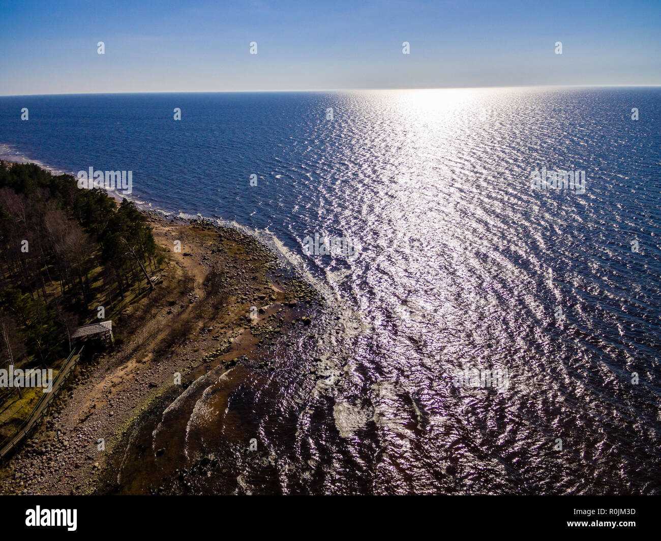drone image. aerial view of rural area with rocky beach of Baltic sea ...