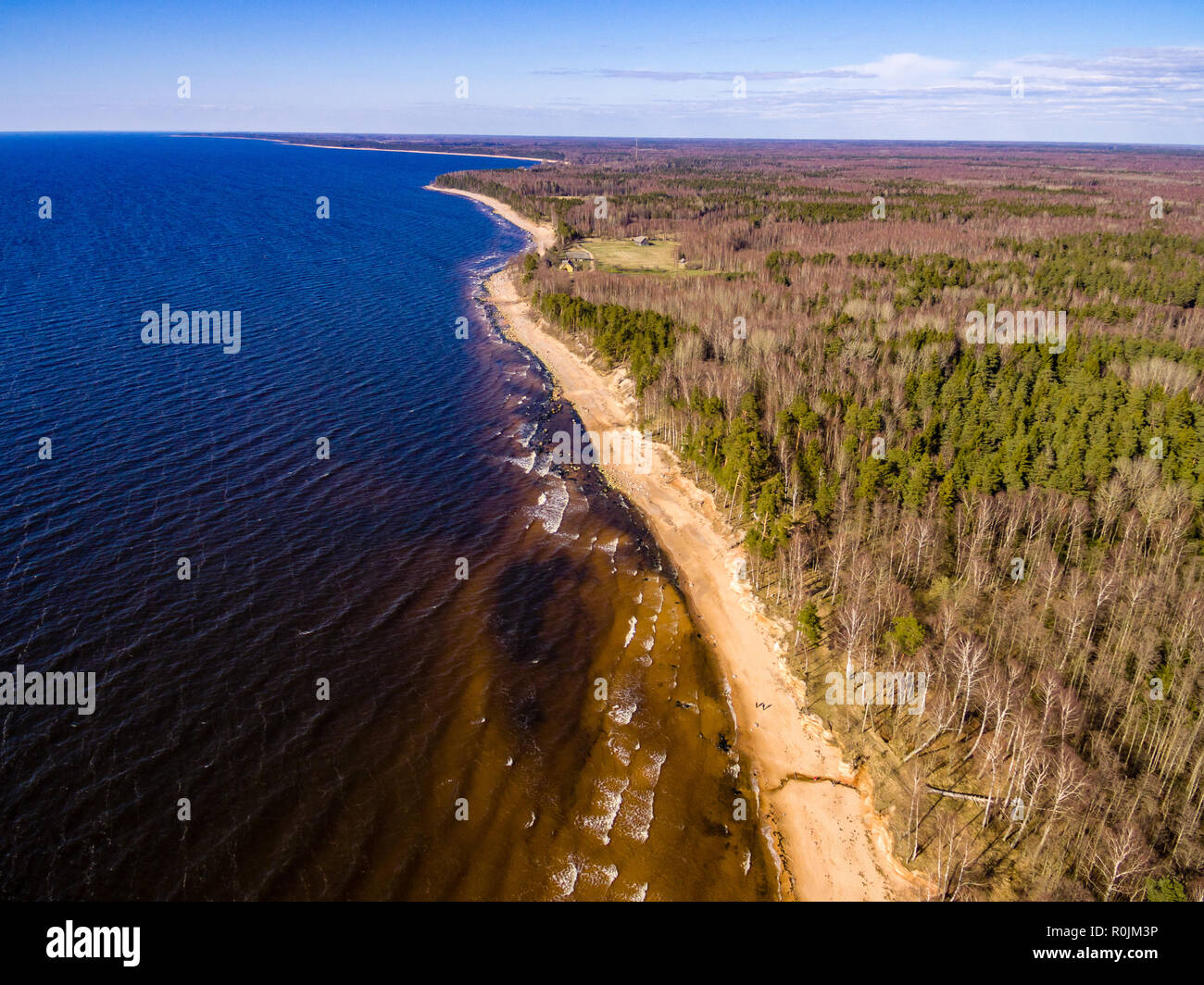 drone image. aerial view of rural area with rocky beach of Baltic sea ...
