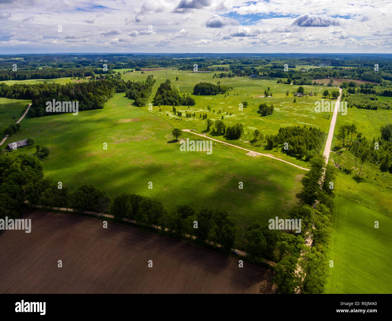 drone image. aerial view of rural area with fields and forests and ...