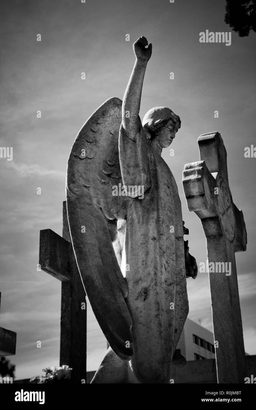 Angel statue back view Black and White Stock Photos & Images - Alamy