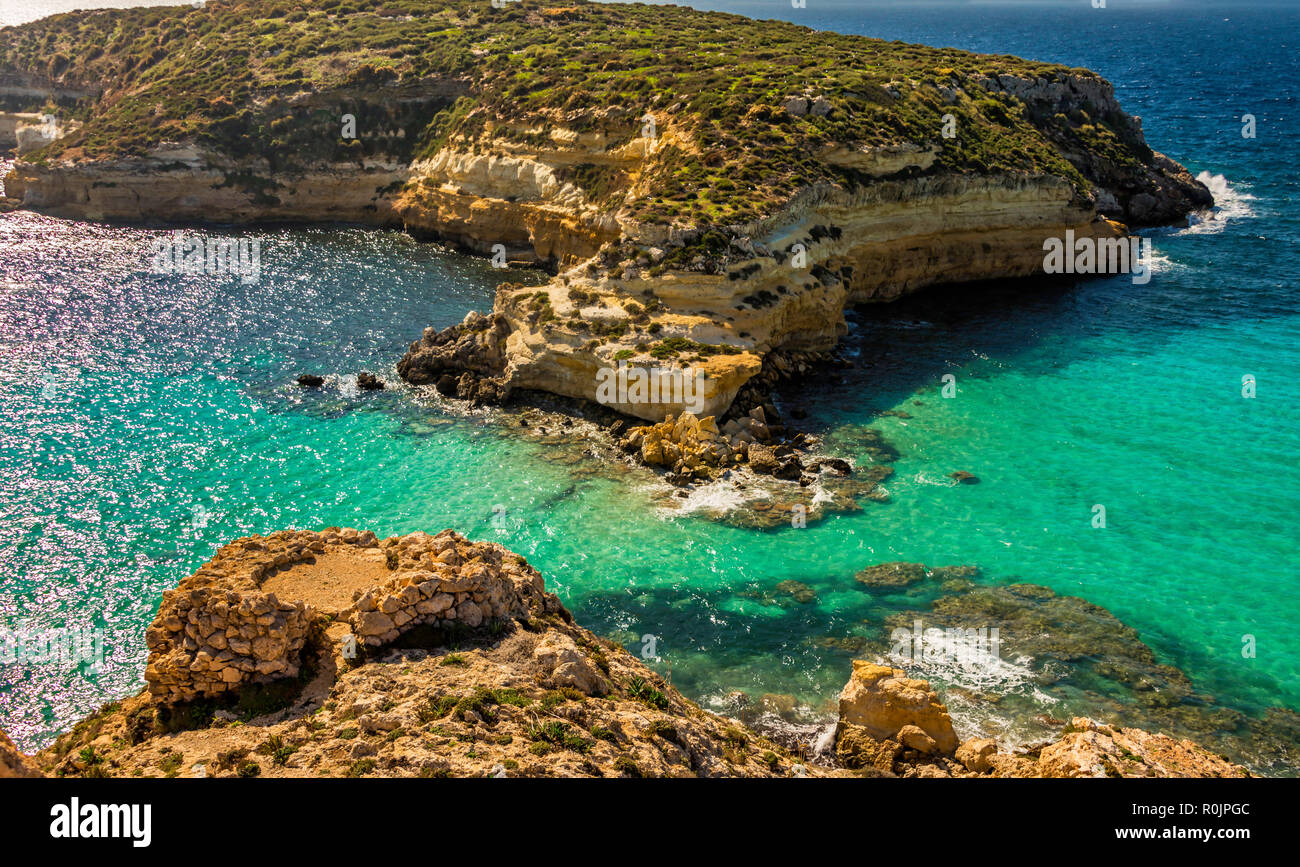 Crystal clear water at the Rabbit beach (Spiaggia dei Conigli) in the ...