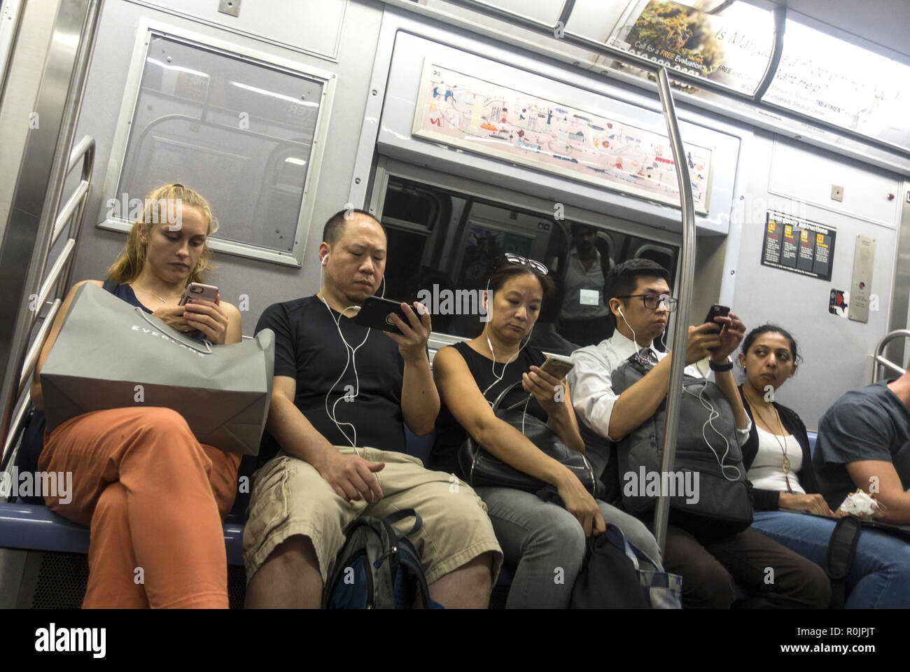 Riders constantly use their smartphones & other electronic devices ...