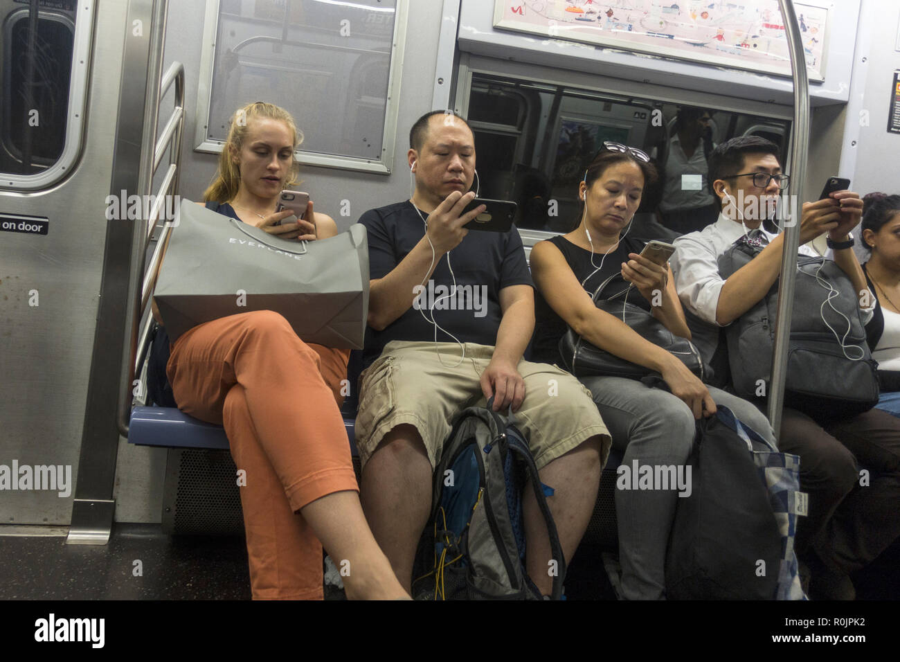 Riders constantly use their smartphones & other electronic devices ...