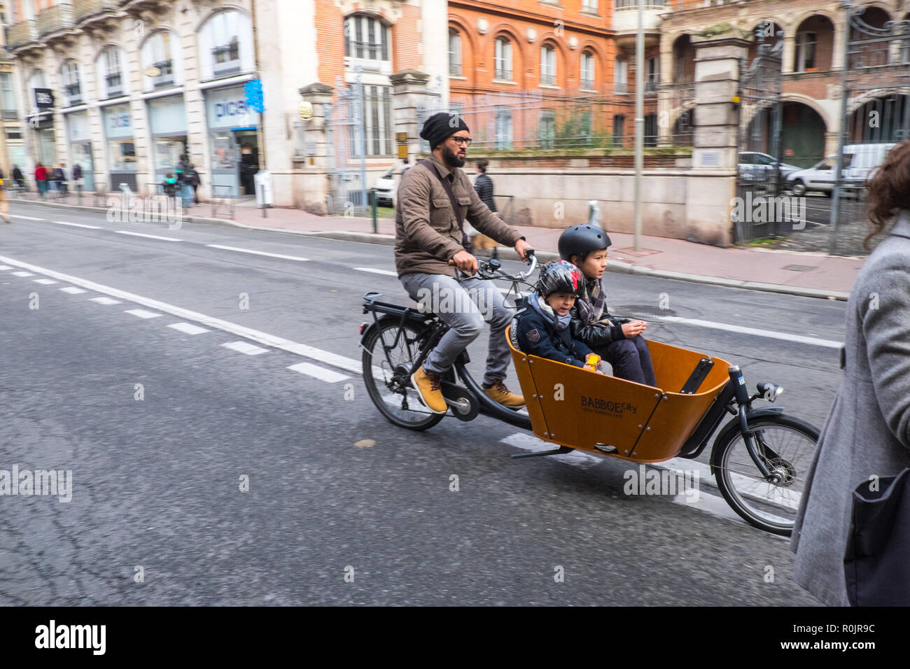 Children bike rain hi-res stock photography and images - Alamy