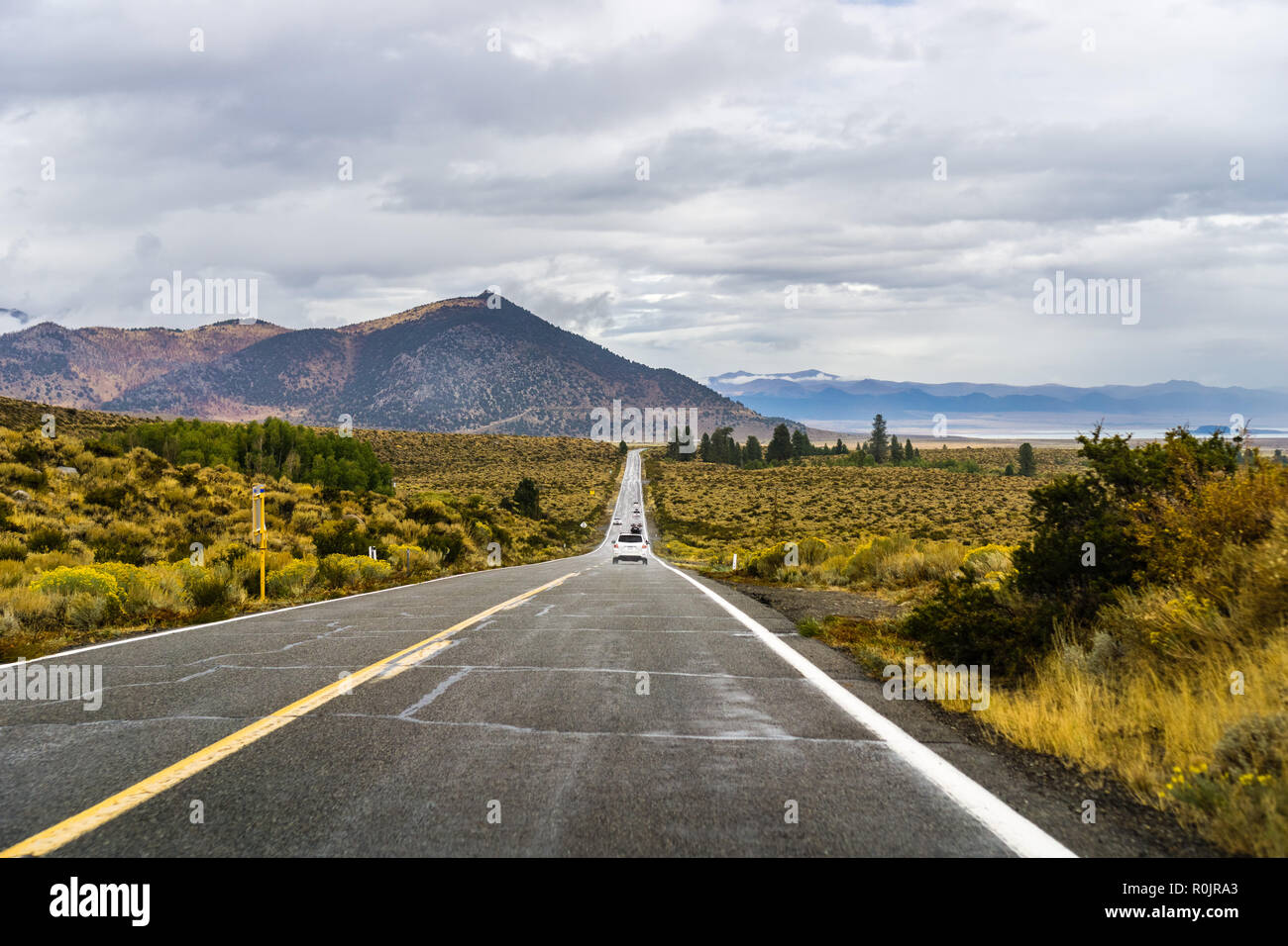 Driving on the freeway towards Mono Lake, Eastern Sierra mountains ...