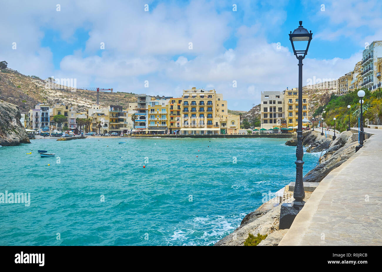 The picturesque natural harbour, located in deep gorge, with a view on ...