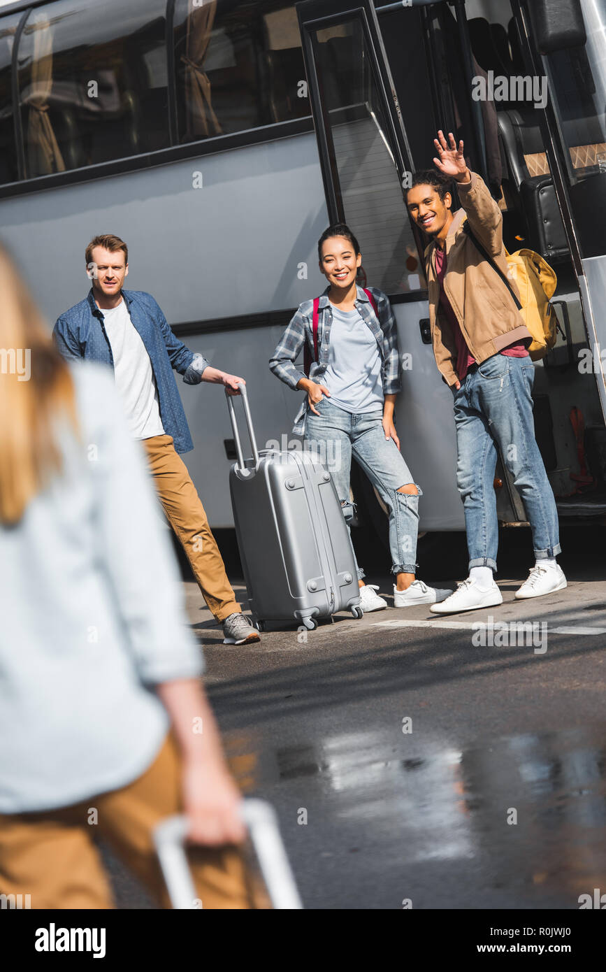 Woman waving bus hi-res stock photography and images - Alamy
