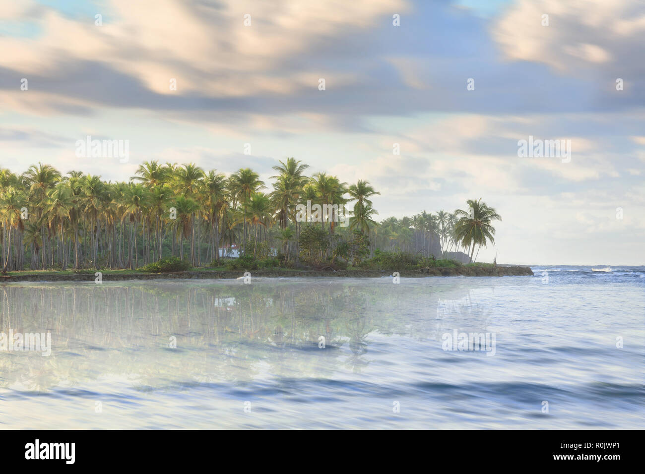 Lonely beach at sunset hi-res stock photography and images - Alamy