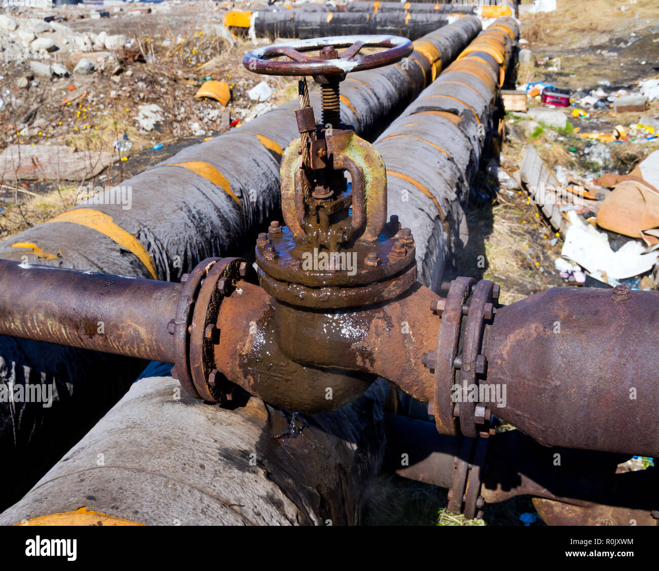 Heating line in a dilapidated state with a leakage valve Stock Photo ...