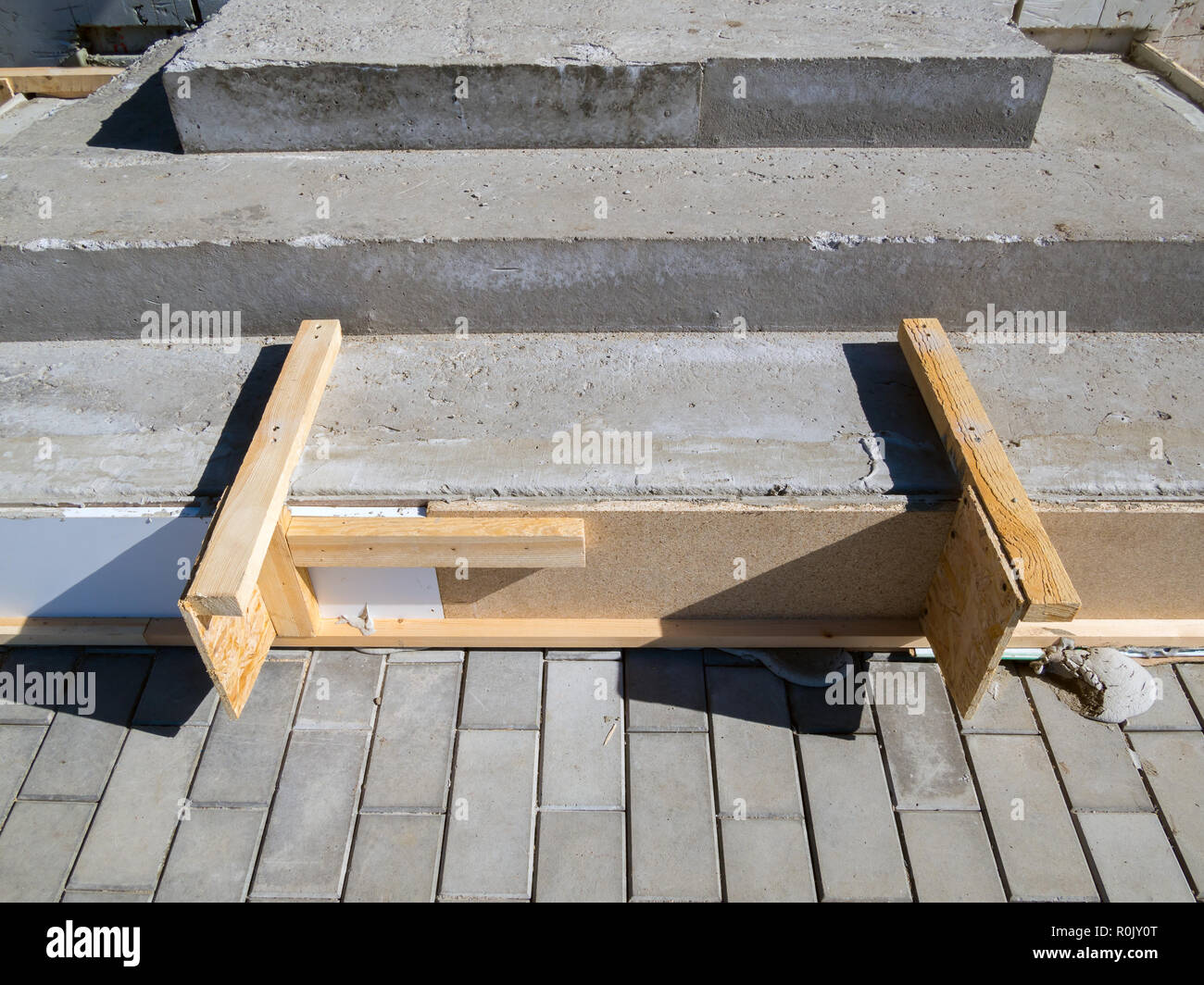 Concreting steps using homemade formwork Stock Photo - Alamy