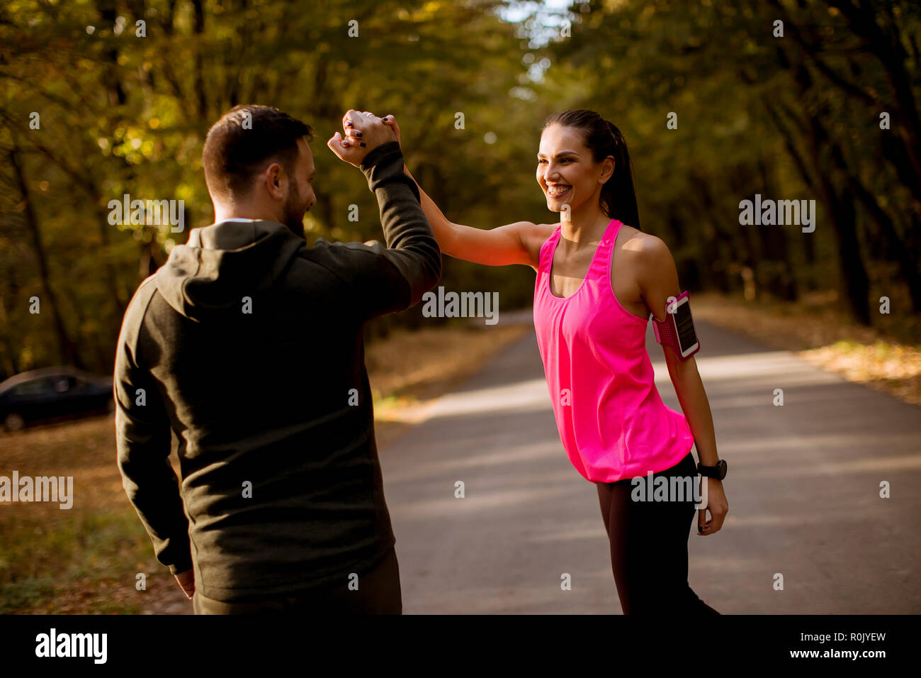 Male female running in autumn hi-res stock photography and images - Alamy