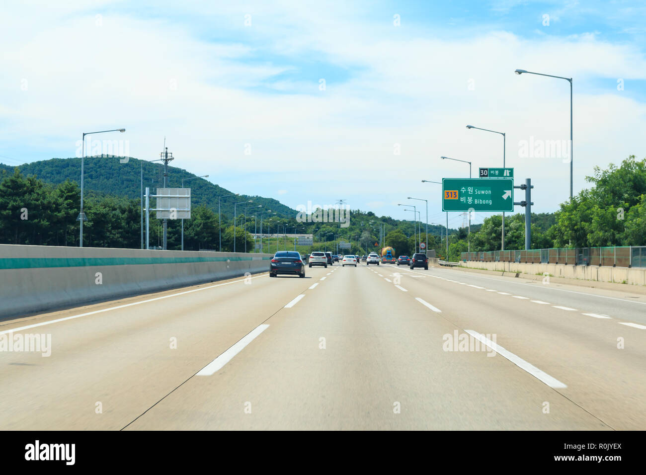 Highway with light traffic in Korea Stock Photo - Alamy
