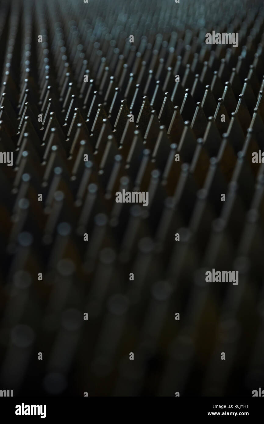 Detail of the sheet metal spikes backdrop Stock Photo - Alamy