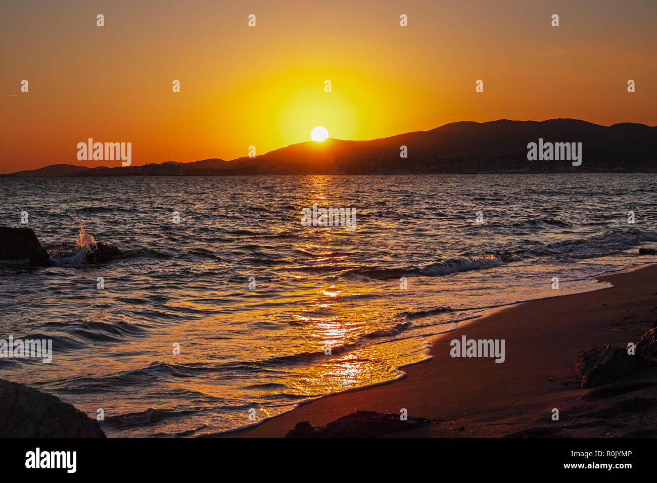 sunset at sea Stock Photo - Alamy
