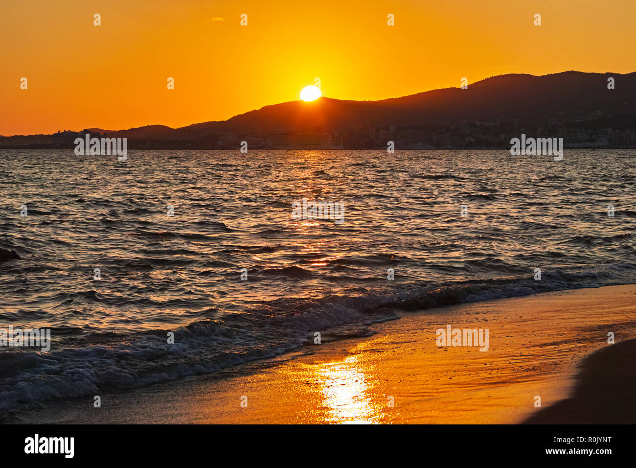 sunset at sea Stock Photo - Alamy