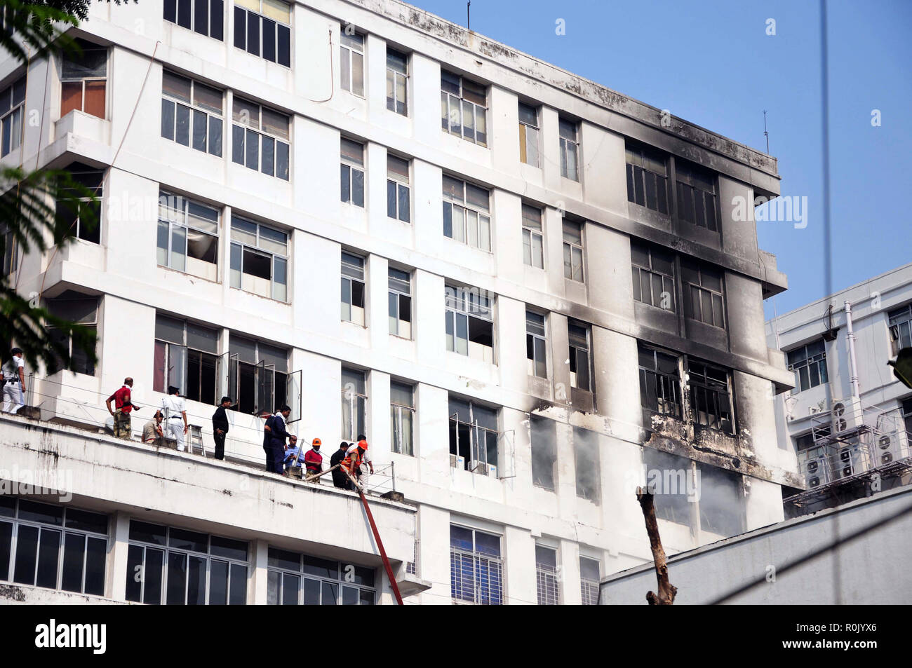 Kolkata, India. 05th Nov, 2018. Smoke billow out from the window after ...