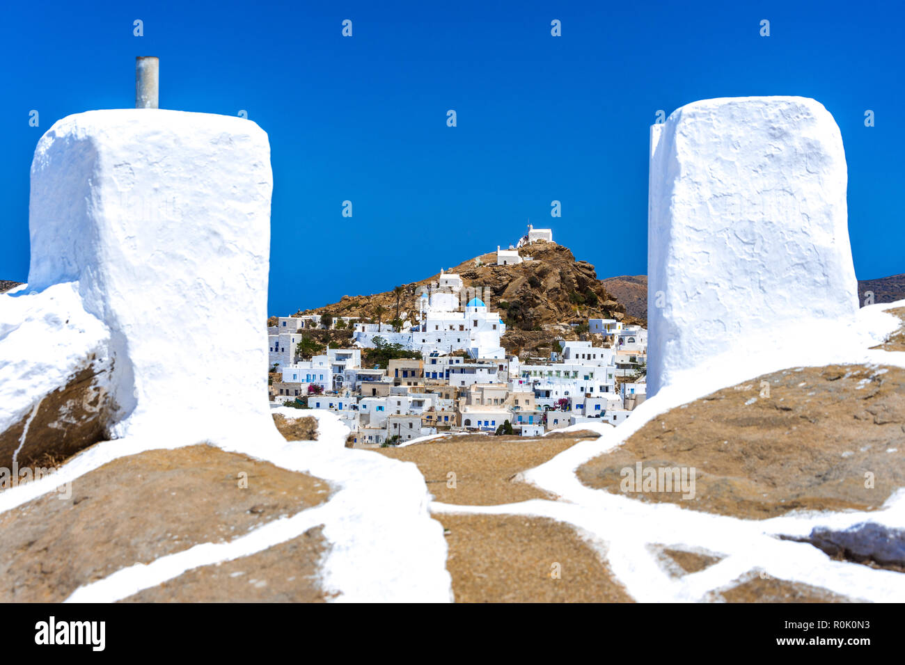 Traditional houses, wind mills and churches in Ios island, Cyclades ...